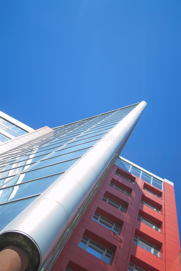 Skyscraper with Mirrored Windows and Clear Blue Sky Stock Image - Image ...