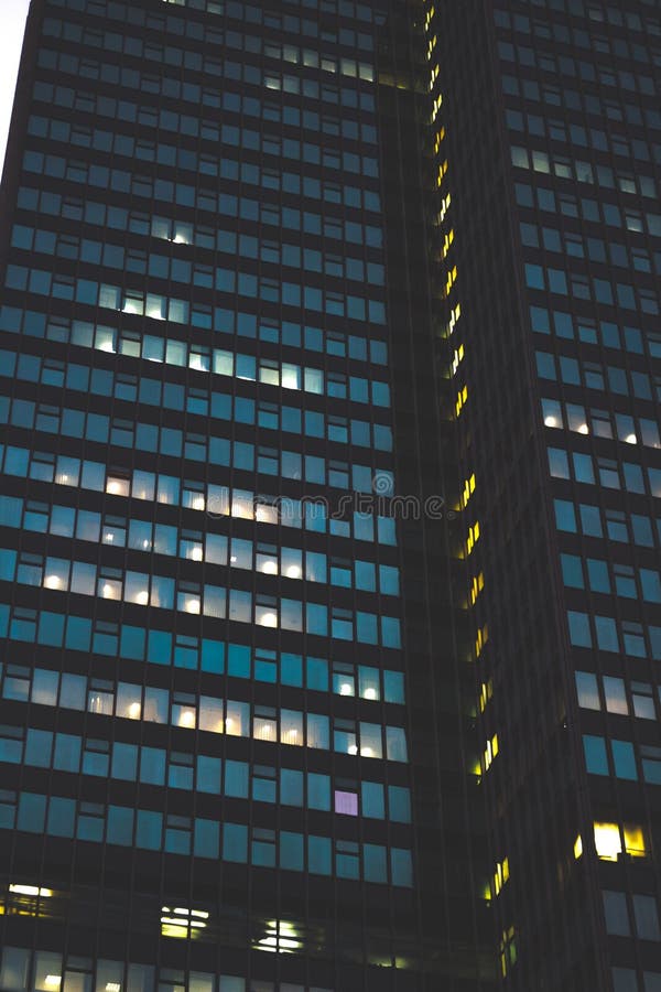 Skyscraper at night stock image. Image of symmetric, light - 84940069