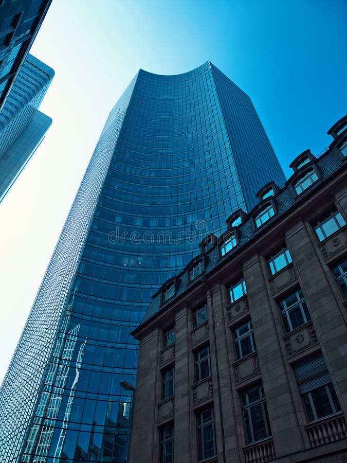 Skyscraper Photographed from Below with Its Own Historic Building in ...