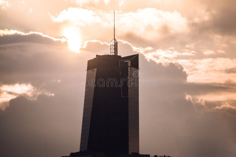 Skyscraper in Rays of Sunset Stock Image - Image of landmark, night ...