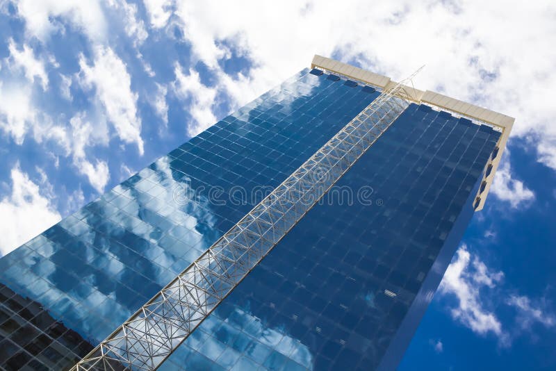 Skyscraper Reflecting Clouds in the Sky Stock Image - Image of district ...