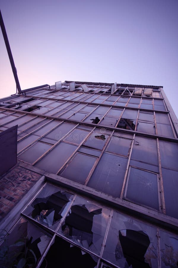 Broken skyscraper stock photo. Image of disaster, brick - 64251464