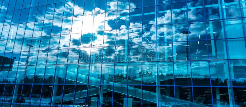 Skyscraper Windows with Reflection of the Sky. Stock Image - Image of ...