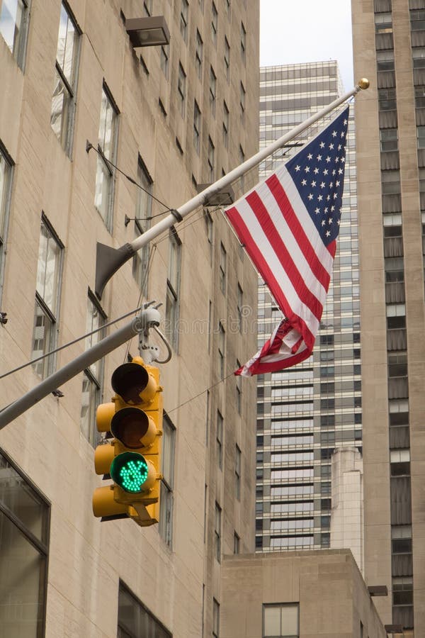 Skyscrapers, American Flag and Traffic Light Stock Photo - Image of ...