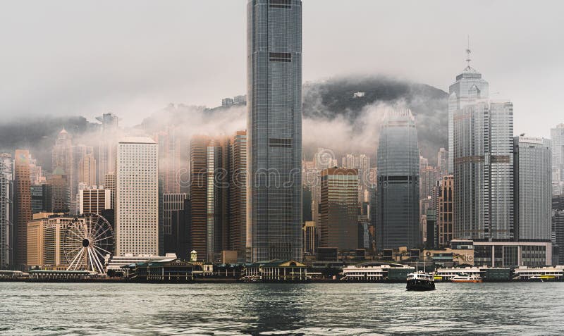 Skyscrapers of a City Covered in Mist Stock Image - Image of tower ...