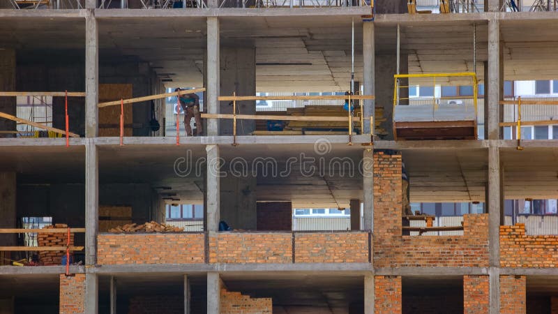 Skyscrapper Building Construction Workers in Different Rooms. Stock ...