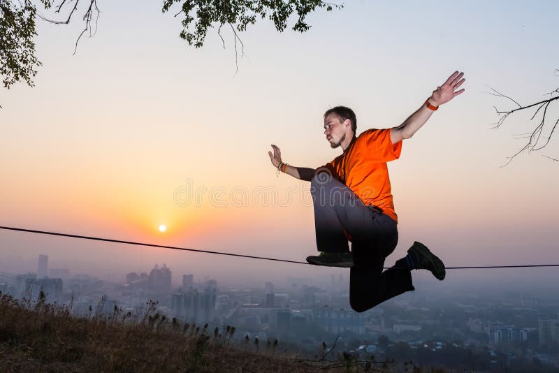 Slackliner in sunset stock photo. Image of individual - 30542280