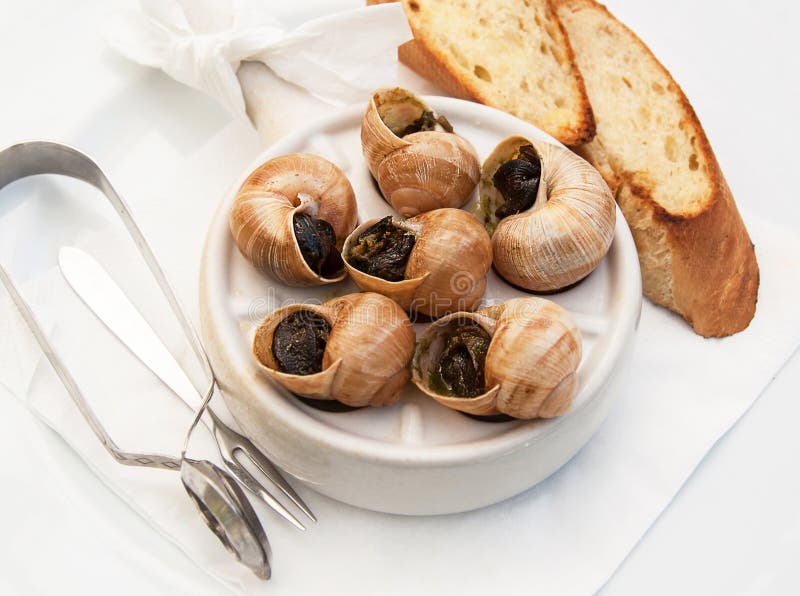 Slakken Als Frans Gastronomisch Voedsel Stock Foto - Image of schotels ...