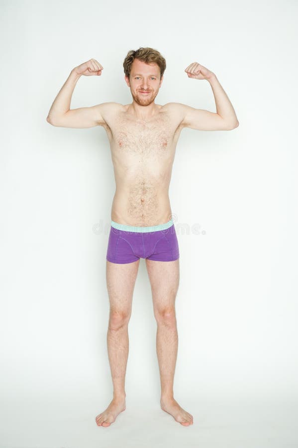 Slanke man toont spieren stock foto. Image of griezelig - 22694754
