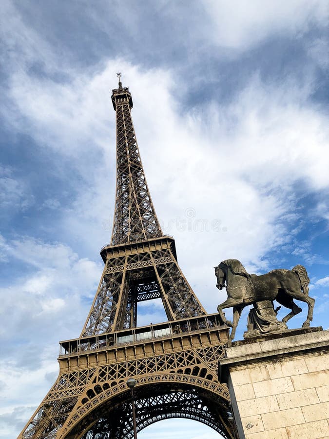 Slanted Eiffel Tower stock image. Image of bluesky, building - 135539627