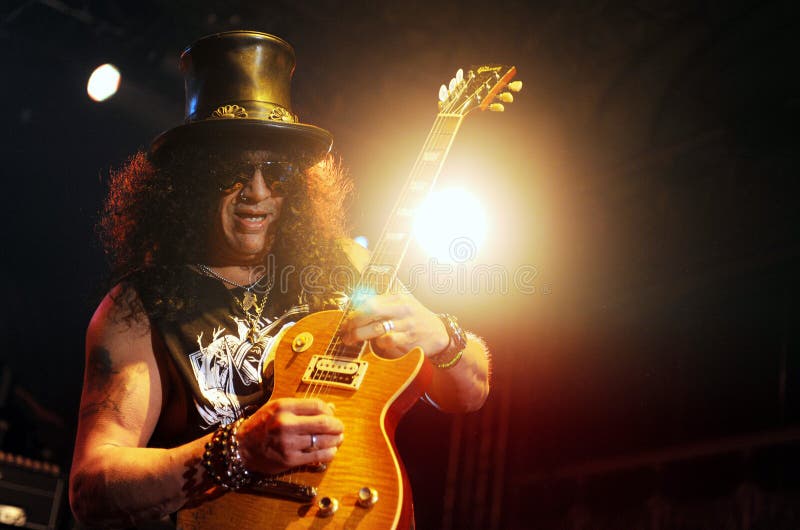 Slash editorial image. Image of live, culture, guns, frizzly - 29173315