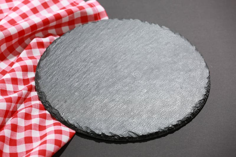 Slate Dish on Black Background Decorated with Checkered Cloth Stock ...