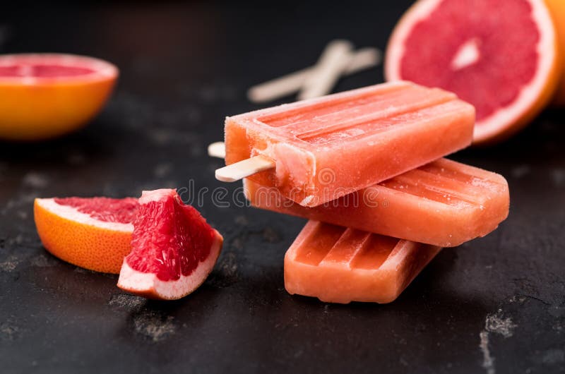 Slate Slab with Fresh Grapefruit Popsicles Selective Focus Stock Photo ... Slate Slab with Fresh Grapefruit Popsicles Selective Focus Stock Photo ...