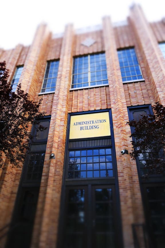 Slective Focus on Administration Building Brick Wall and Windows Stock ...