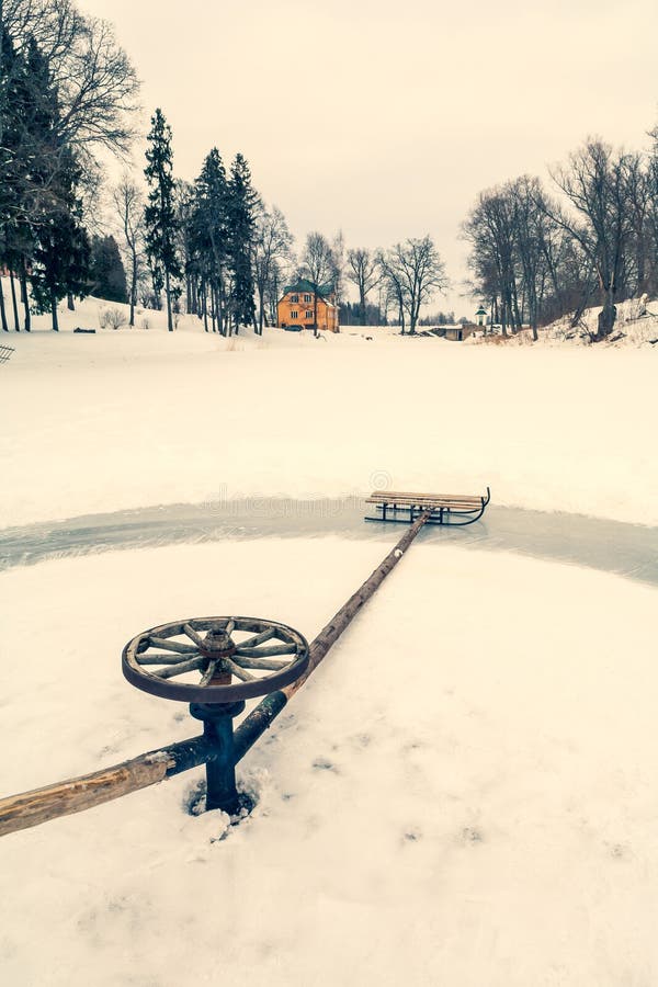 Sled on the Ice of the Pond in Winter Stock Photo - Image of freezing ...