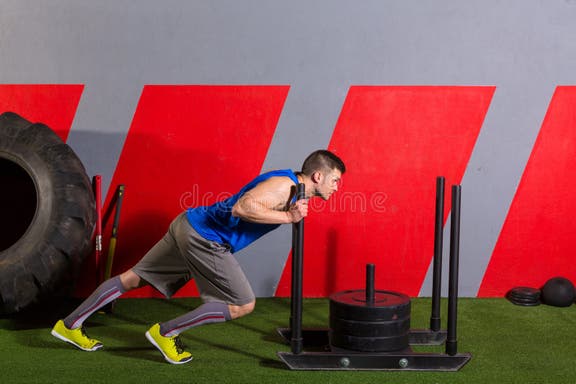 Sled Push Man Pushing Weights Workout Exercise Stock Photo - Image of ...