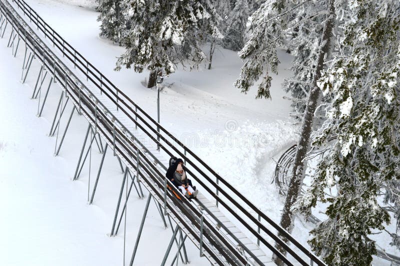 Sledding on the rails stock image. Image of snow, cold - 173041487