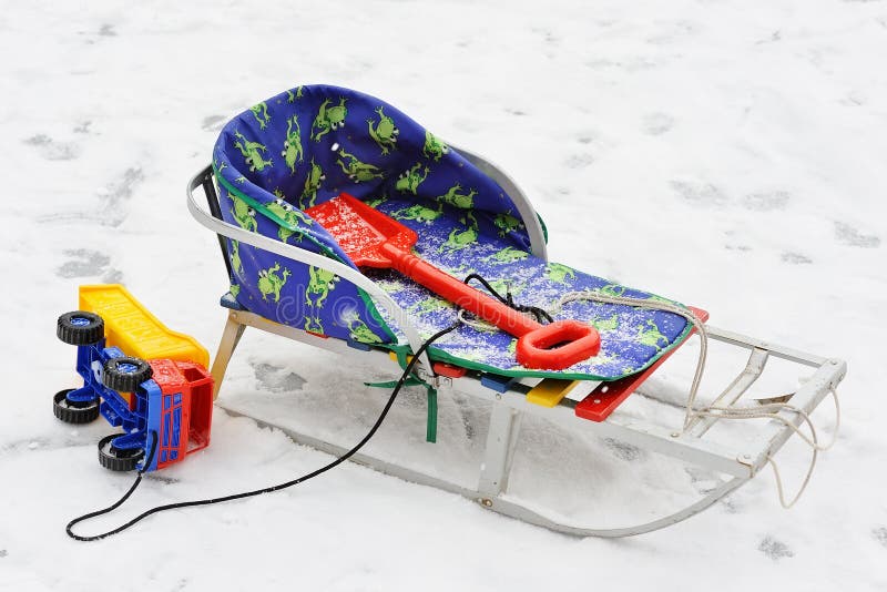 Sledge, Children S Paddle, and Toy Truck Stock Image - Image of frost ...
