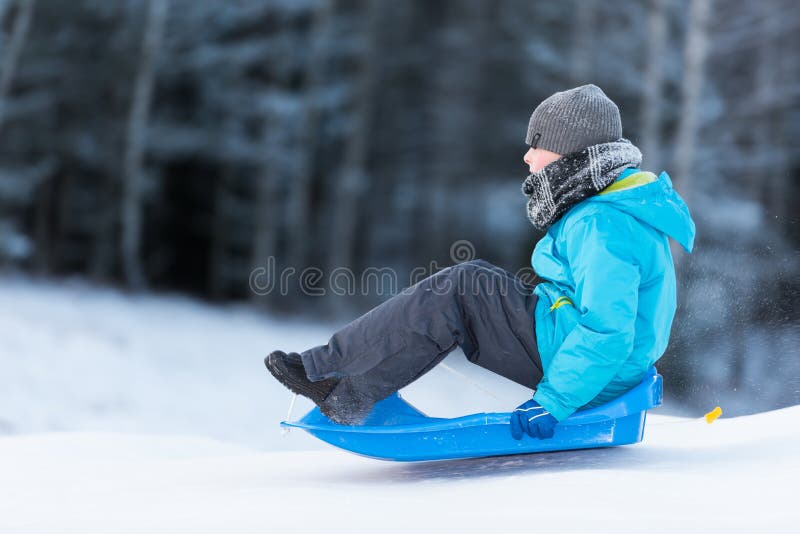 Sledging Downhill with Speed Stock Photo - Image of play, active: 49274966