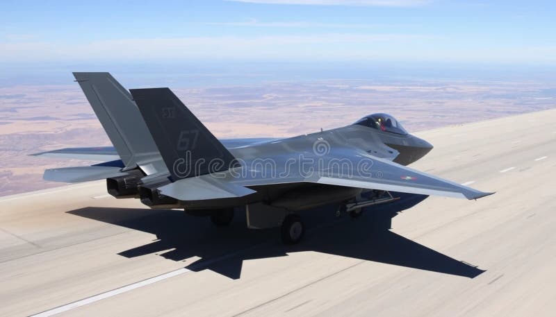 A Sleek, Gray Fighter Jet with Angular Wings and Dual Vertical ...