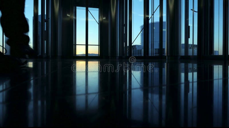 Modern Skyscraper Interior with Stunning Evening Cityscape View through ...