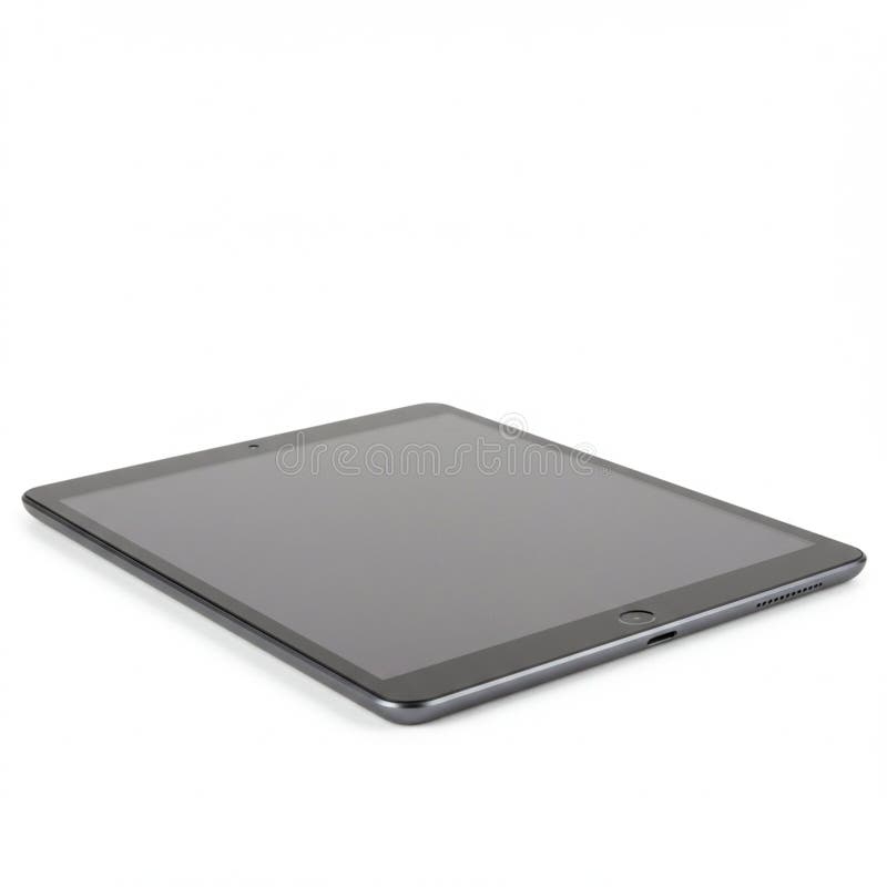 A Sleek Tablet Device with a Black, Glossy Screen Rests on a Flat ...