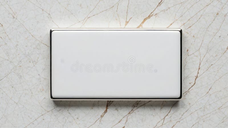 Sleek White Rectangle with Metallic Edges on Marble Surface, Modern and ...