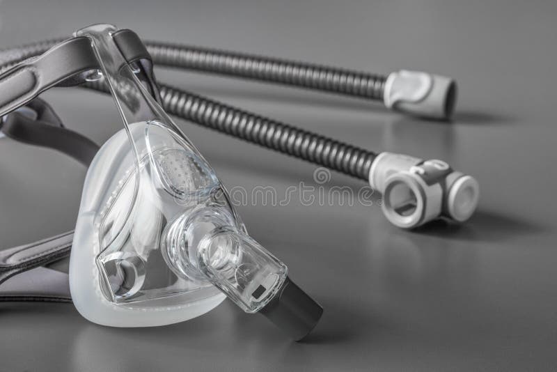 Sleep Apnea CPAP Mask on the Grey Background Stock Photo - Image of ...