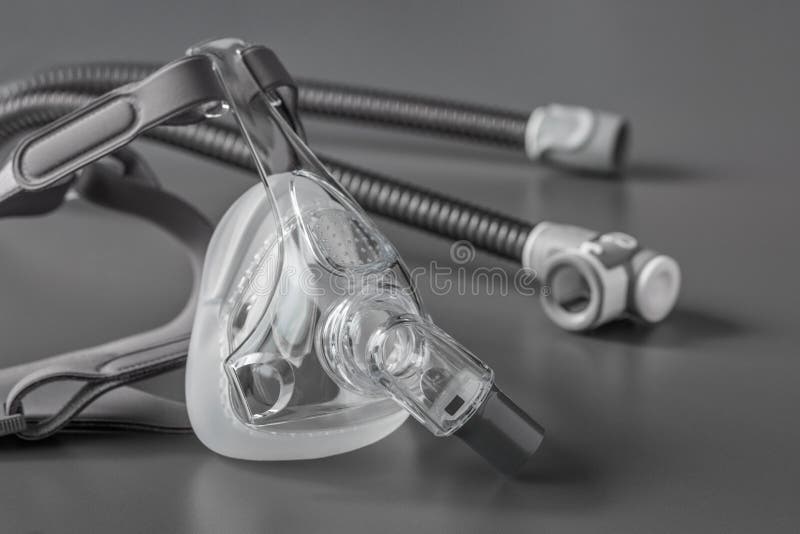 Sleep Apnea CPAP Mask on the Grey Table Stock Photo - Image of therapy ...