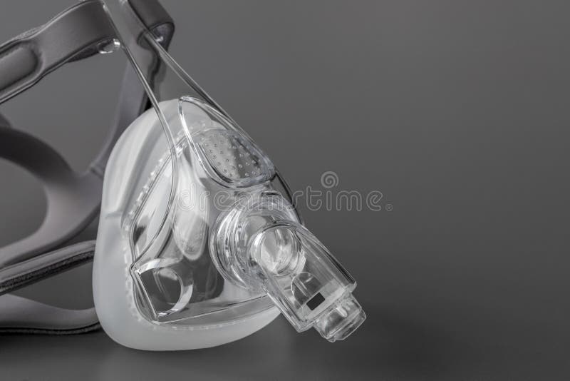 Sleep Apnea CPAP Mask on the Grey Table Stock Photo - Image of therapy ...