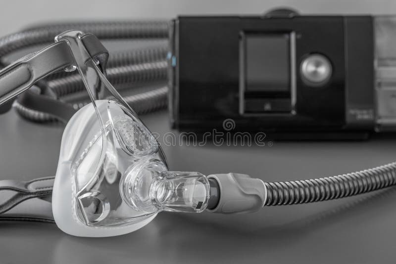 Sleep Apnea CPAP Mask on the Grey Table Stock Photo - Image of therapy ...