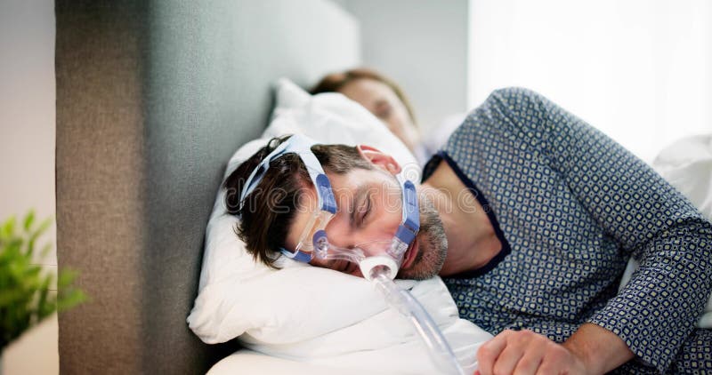 Sleep Apnea Oxygen Mask Equipment Stock Photo - Image of couple, family ...