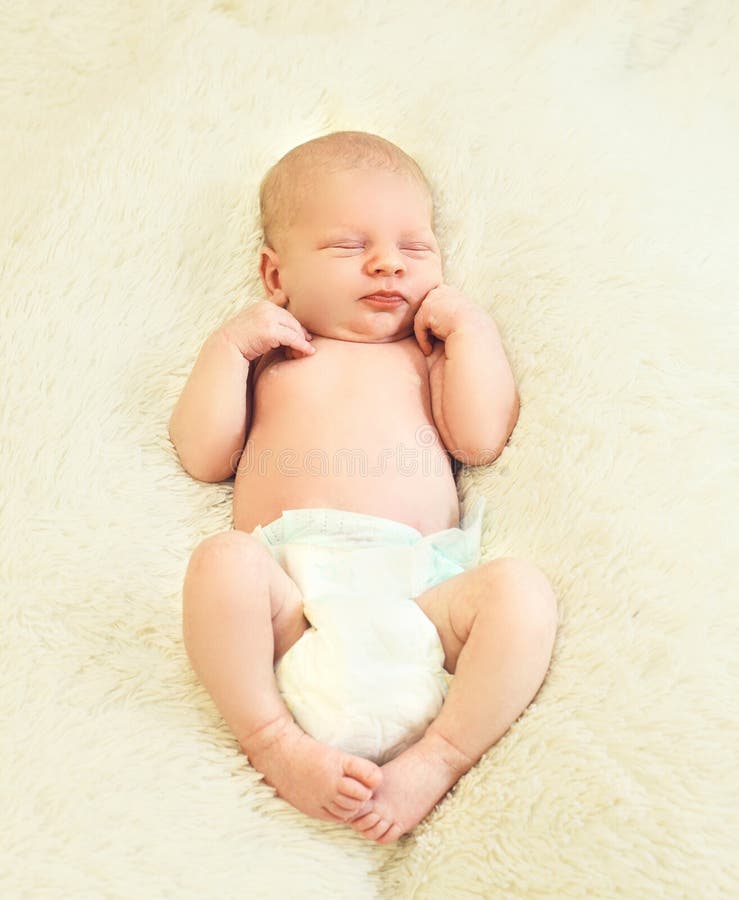 Sleep Baby in Diapers Lying on the Bed Home Stock Photo - Image of life ...