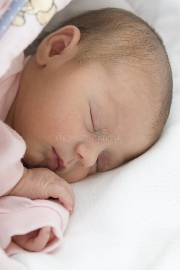 Baby sleeping in red stock photo. Image of eyes, happy - 1285162