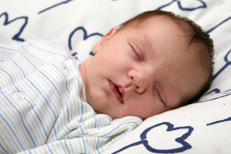 Sleeping baby stock image. Image of tired, arms, little - 5105415