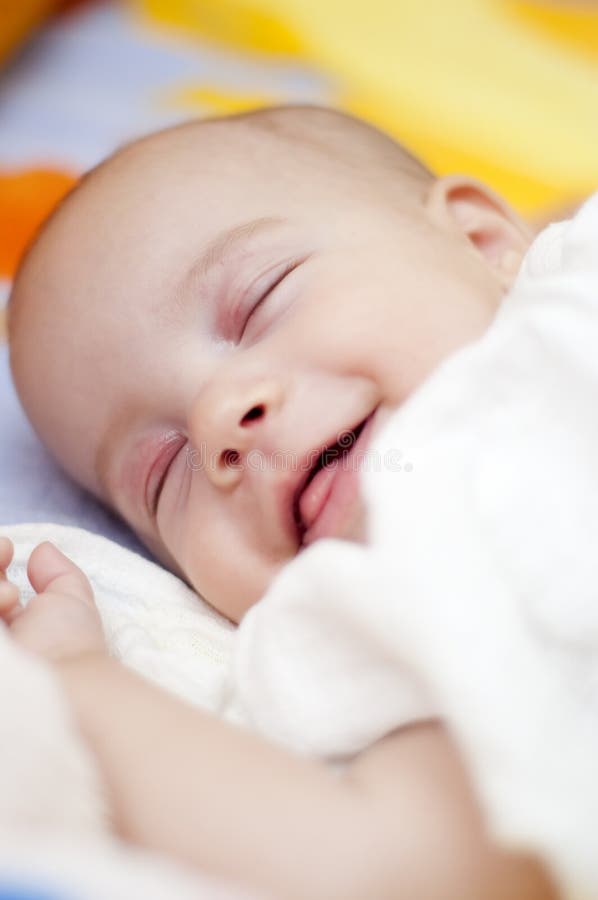 Sleeping Baby Smiling stock image. Image of laugh, infant - 27876141