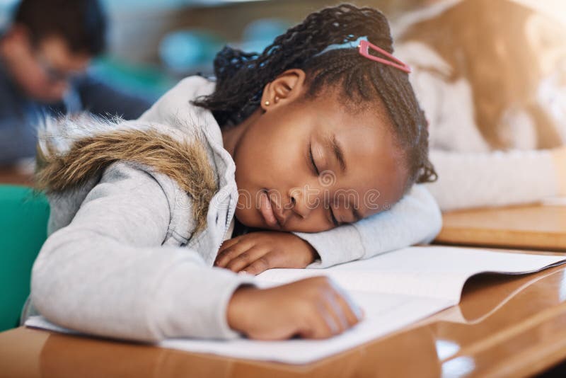 Sleeping Beauty in Class. an Elementary School Girl Taking a Nap in the ...