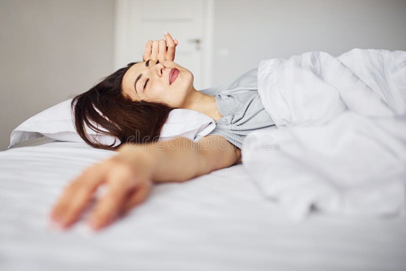 Sleeping on the Bed. Young Woman Resting and Spending Weekend at Home ...