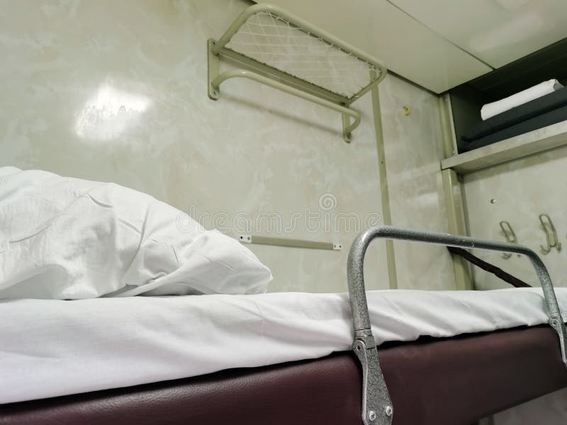 Sleeping Compartment of a Passenger Train from the Inside. Upper Berth ...