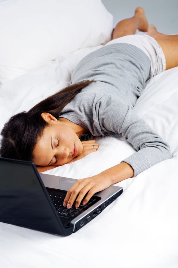 Sleeping on computer woman stock image. Image of computer - 27343101