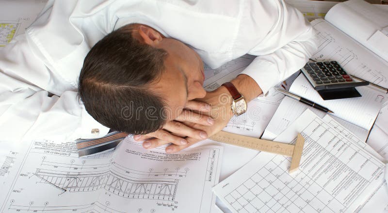 Sleeping engineer- planner stock photo. Image of finger - 14435784