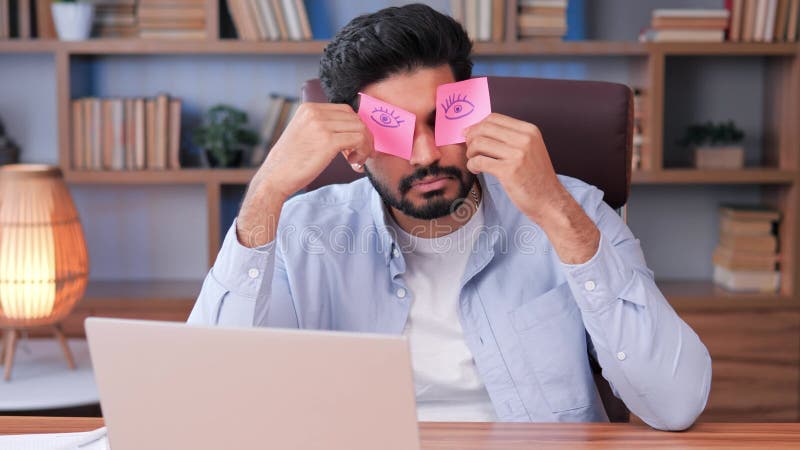 Sleeping Indian Man Humorous Nap at Desk, Using Sticky Notes To Cover ...