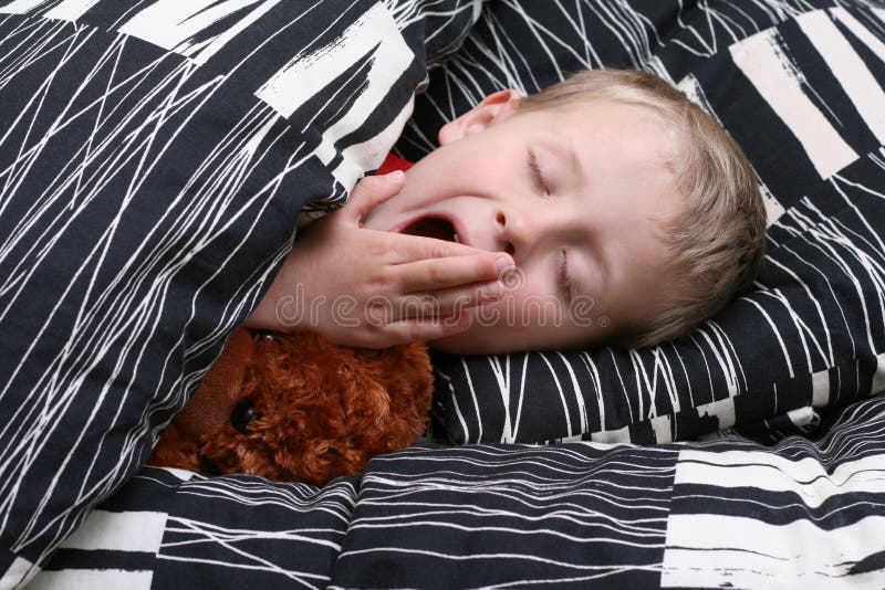 Sleeping kid stock image. Image of relaxation, bedding - 9167711
