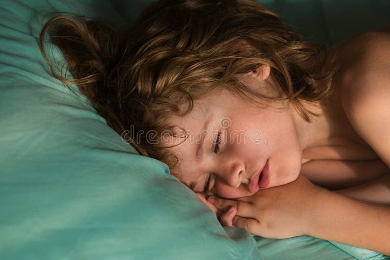Sleeping Kids Lies in Bed with Eyes Closed. Stock Image - Image of ...