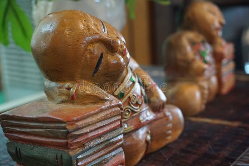 Sleeping monk doll stock image. Image of background - 202761113