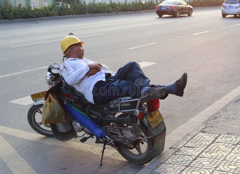 Sleeping on the motorcycle editorial photo. Image of blue - 35046351