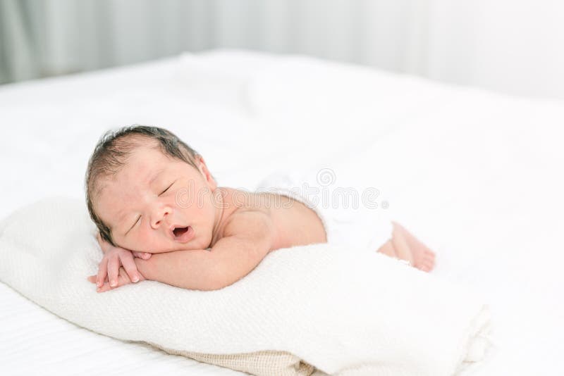 Sleeping Newborn Baby in Bright Wrap, 2 Weeks Baby Stock Image - Image ...