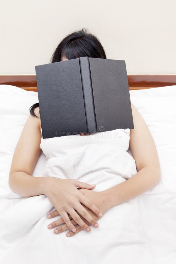 Sleeping after Reading Book Stock Image - Image of night, bedroom: 26657511