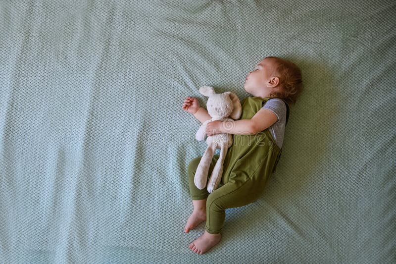 Sleeping Toddler Cuddling a Soft Plush Toy Stock Image - Image of ...