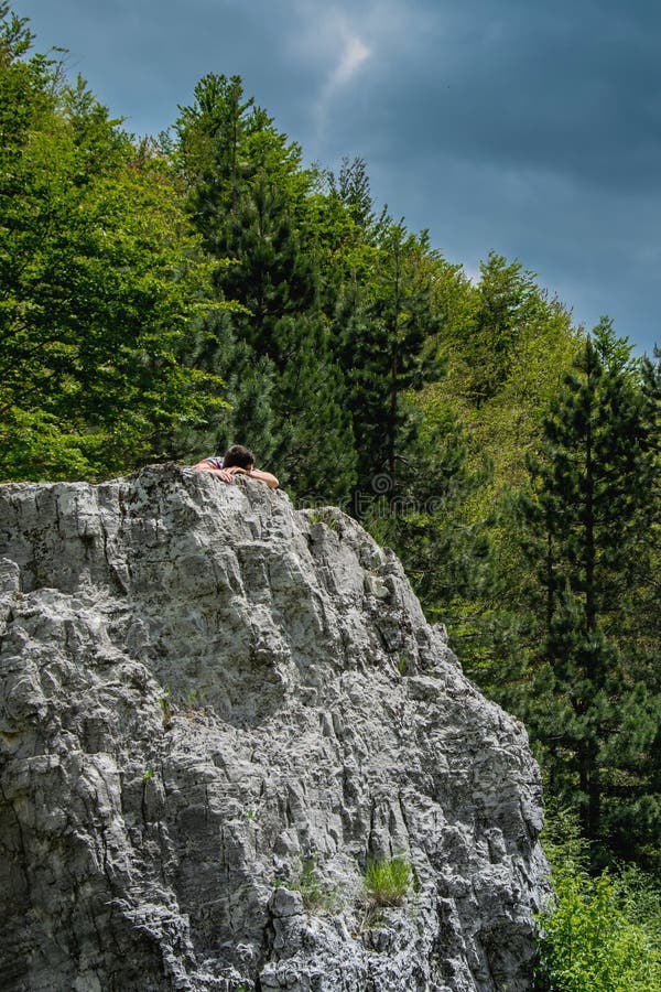 Sleeping on the Top of the Rock in the Mountain Stock Photo - Image of ...